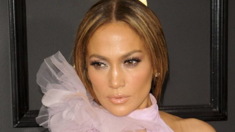Jennifer Lopez jumps out of her see-through catsuit and barely tames ...